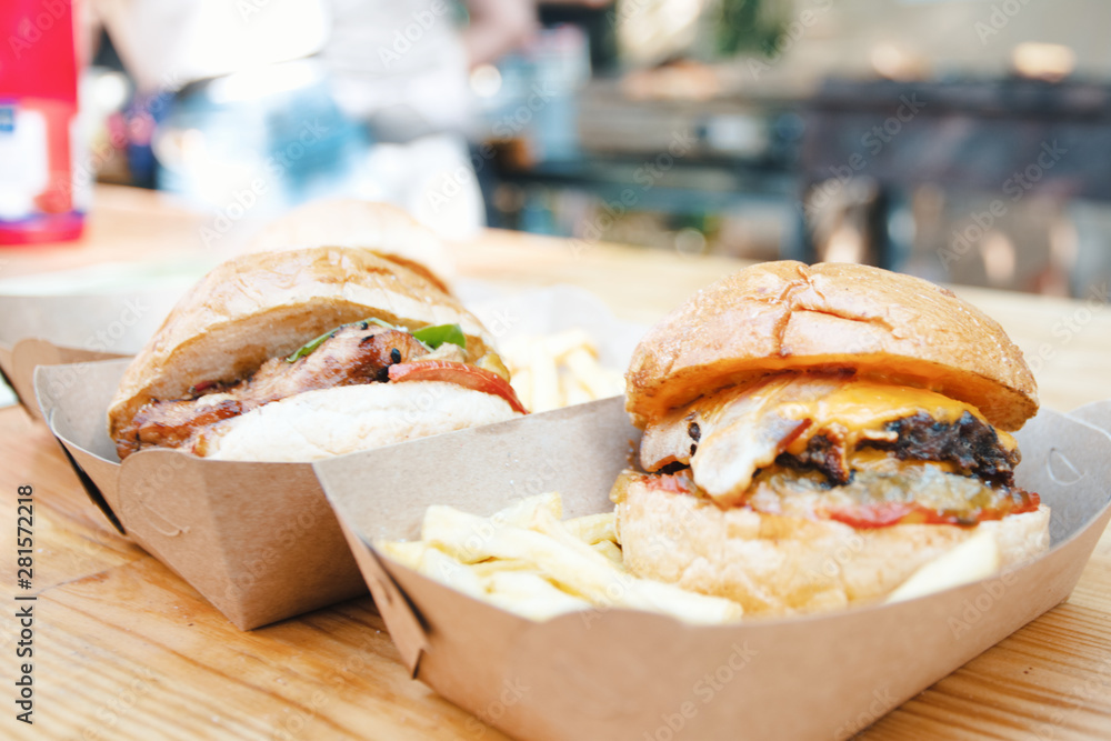Street food festival background. Delicious burgers and French fry ...