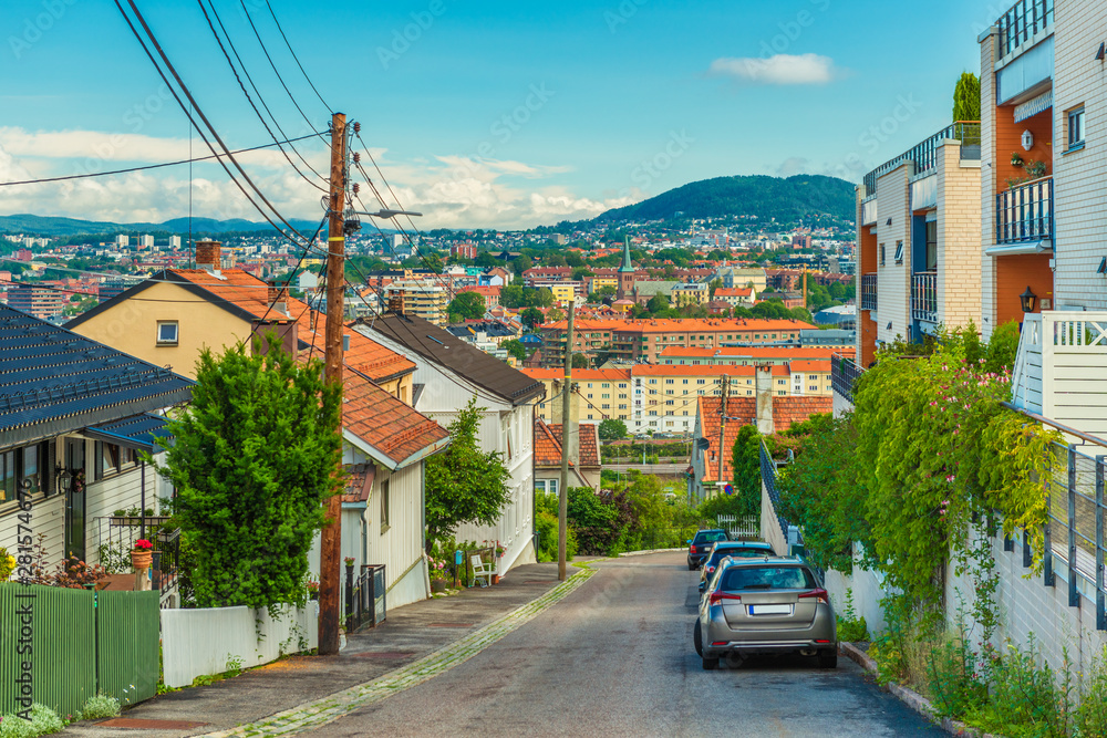 A street in Oslo, Norway. Beautiful view from a hill with old wooden ...