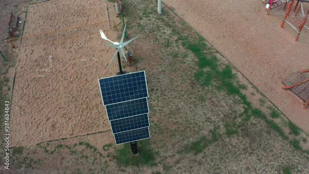 Flight over a deca square with solar panels in Poland. Aerial shot in ...
