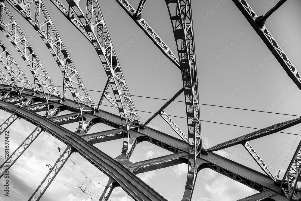 black and white image of metal structures of the bridge. fragments of ...
