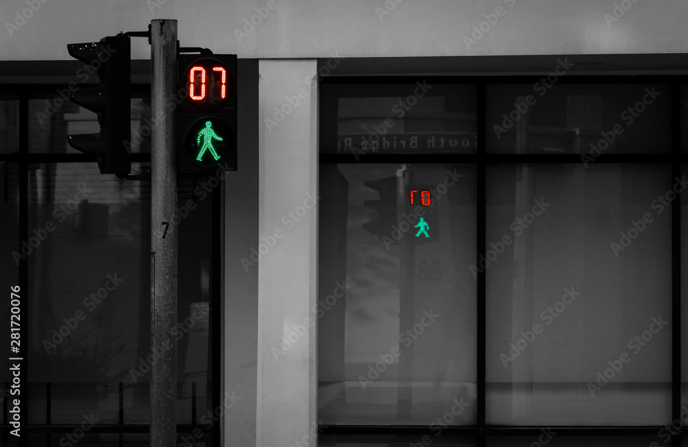 Pedestrian signals on traffic light pole. Pedestrian crossing sign for ...