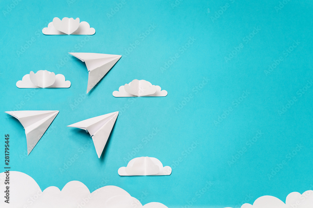 3 origami planes and paper cut sky with clouds. Craft objects for ...