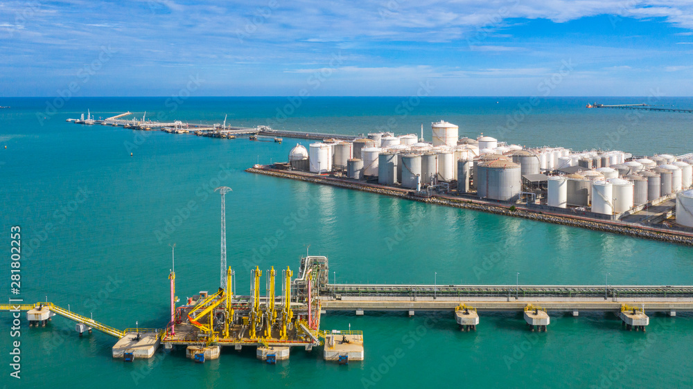 Aerial view loading arm oil and gas refinery at commercial port, Tank ...