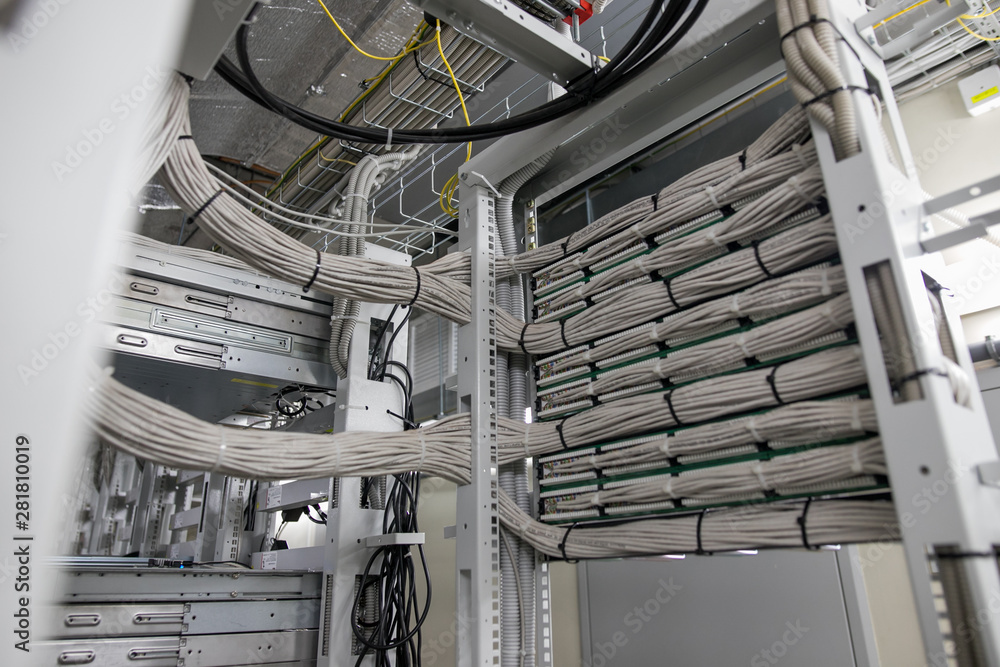 Poster Network Gigabit Smart Switch with network cables installed in ...