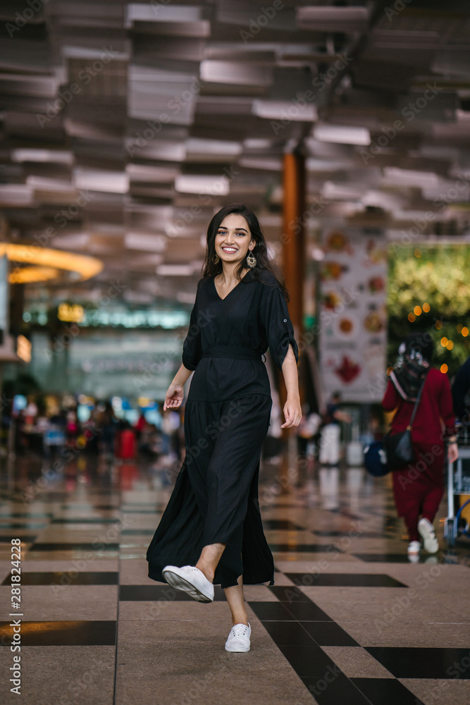 Full body portrait of a young and attractive Indian Asian woman ...