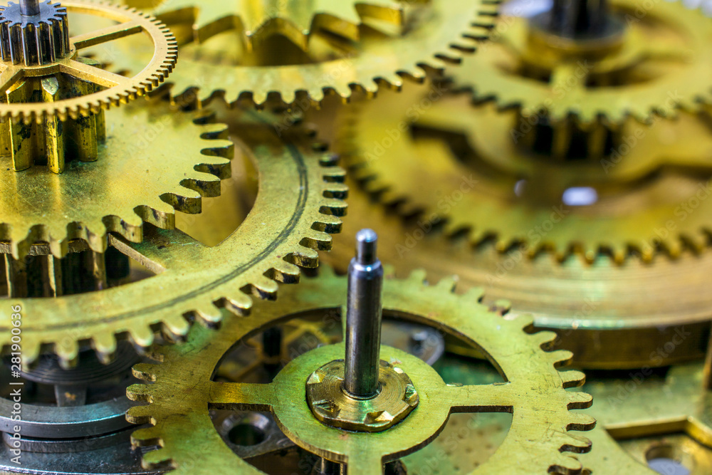 Bronze cog-wheels of old mechanism of clock close up. Stock Photo ...