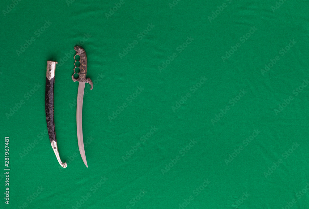 islamic sword, turkish dagger of the ottoman empire isolated on green ...