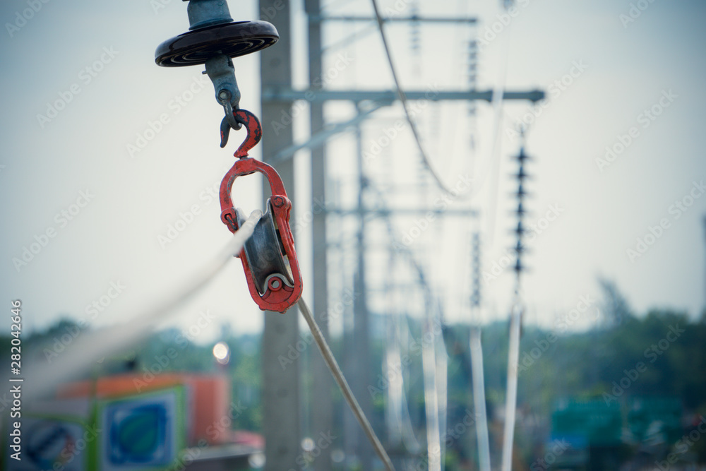 Construction process install aluminum electrical wires with insulators ...