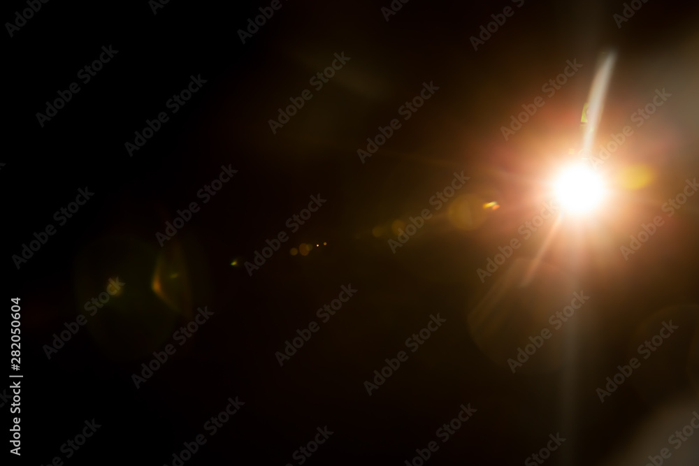 Abstract Natural Sun flare on the black background. Stock Photo | Adobe ...