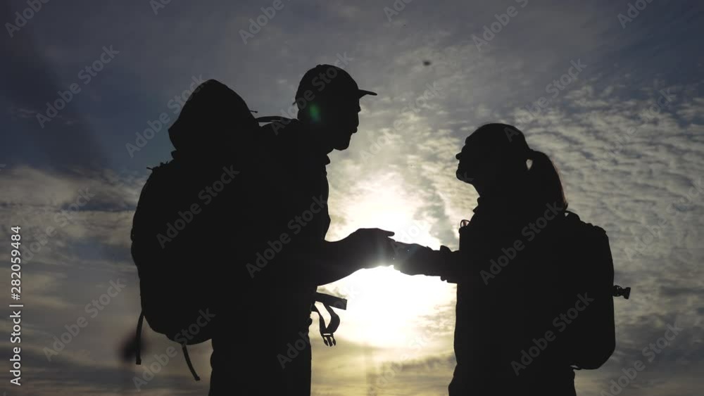 teamwork tourism navigation concept. happy family hikers silhouette in ...