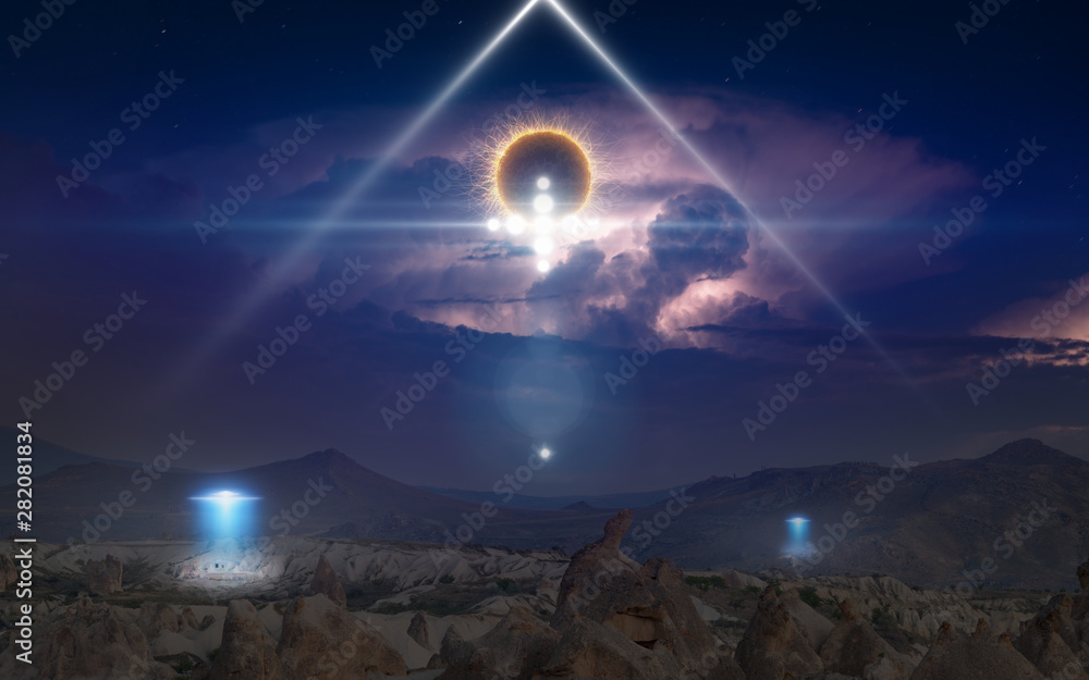 Alien ships inspect the planet's surface with bright spotlights ...