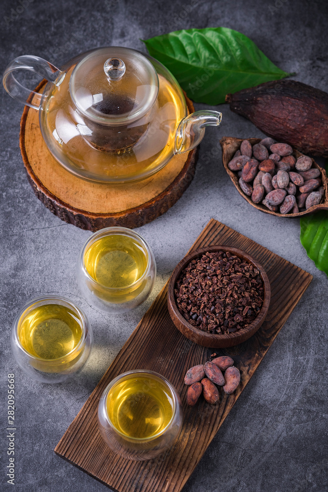 Hot Cacao Tea. Fresh hot chocolate herbal tea made of cacao bean flakes ...