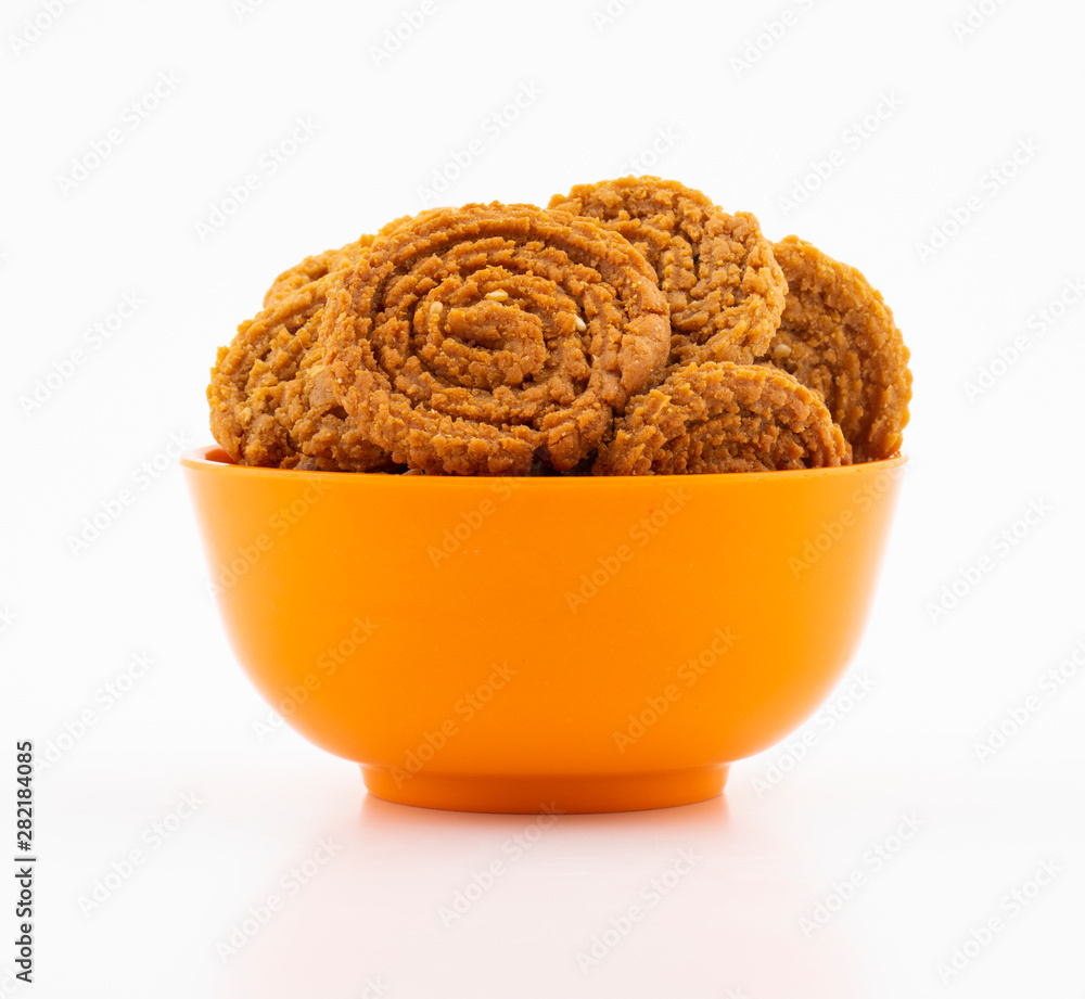 Indian Traditional Snack Chakli, a spiral shaped crisp deep fried snack ...