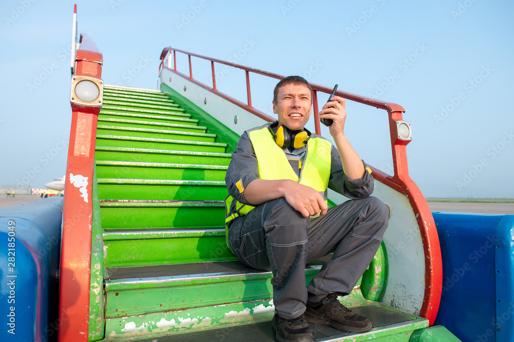 airport worker radio coordinate control ladder terminal Stock Photo ...