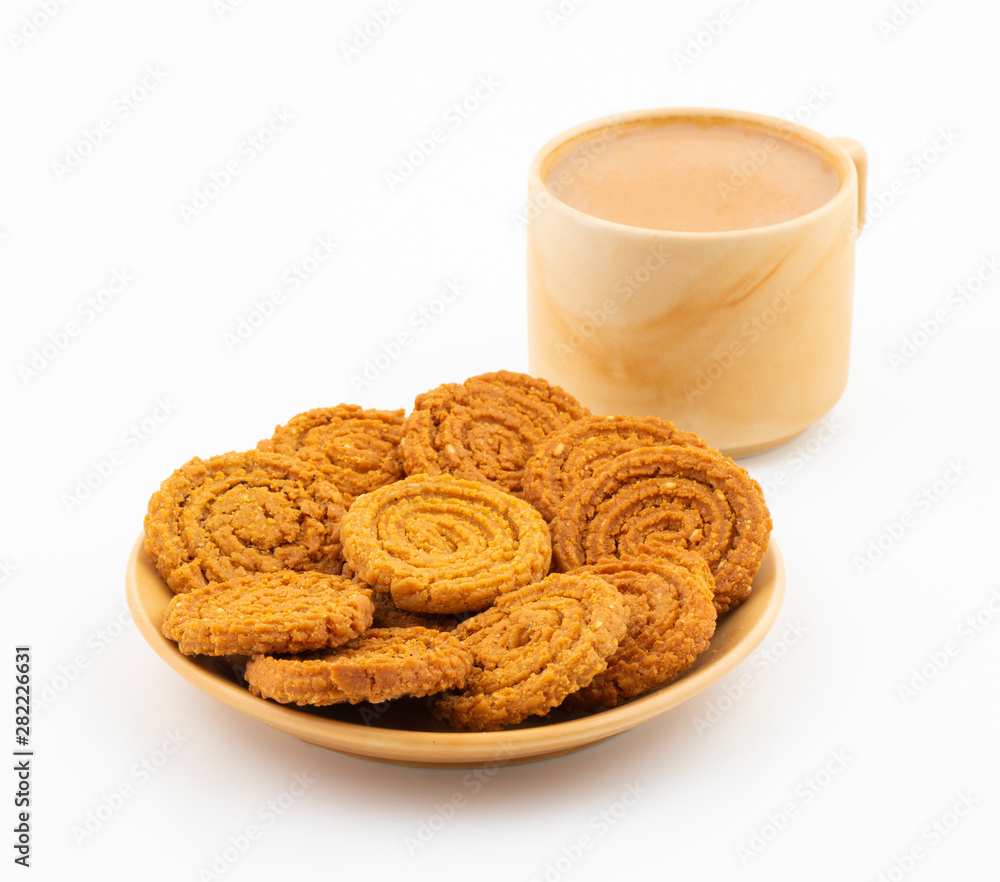 Indian Traditional Tea Time Snack Chakli, a spiral shaped crisp deep ...