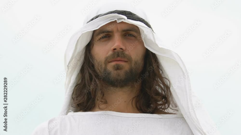 Handsome male arab looking into camera, wearing keffiyeh, traditional ...