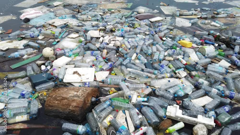 Plastic pollution trash in ocean with different kinds of garbage ...