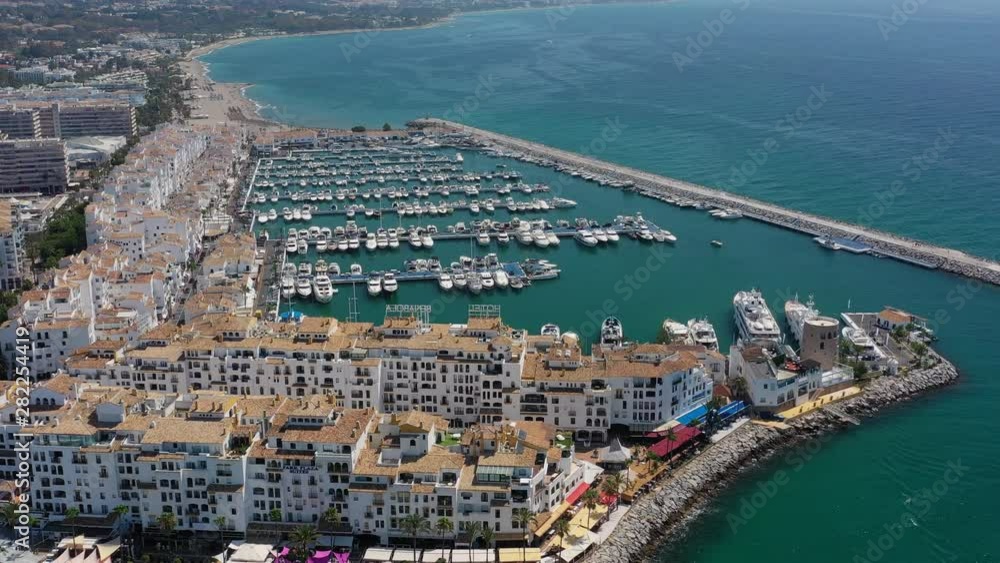 Aerial view of Puerto Banus near city of Marbella, many ships, boats ...
