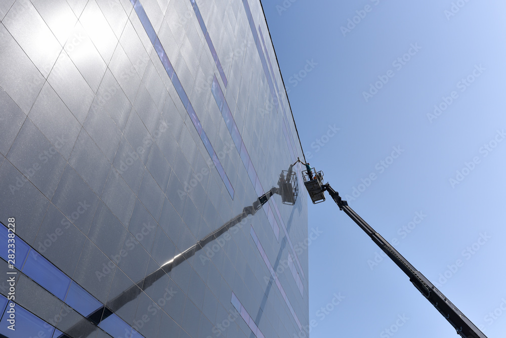 window cleaning business center with use lift crane Stock Photo | Adobe ...