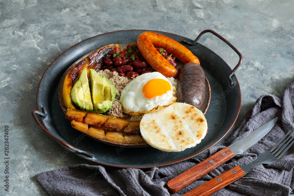 Colombian food. Bandeja paisa, typical dish at the Antioquia region of ...