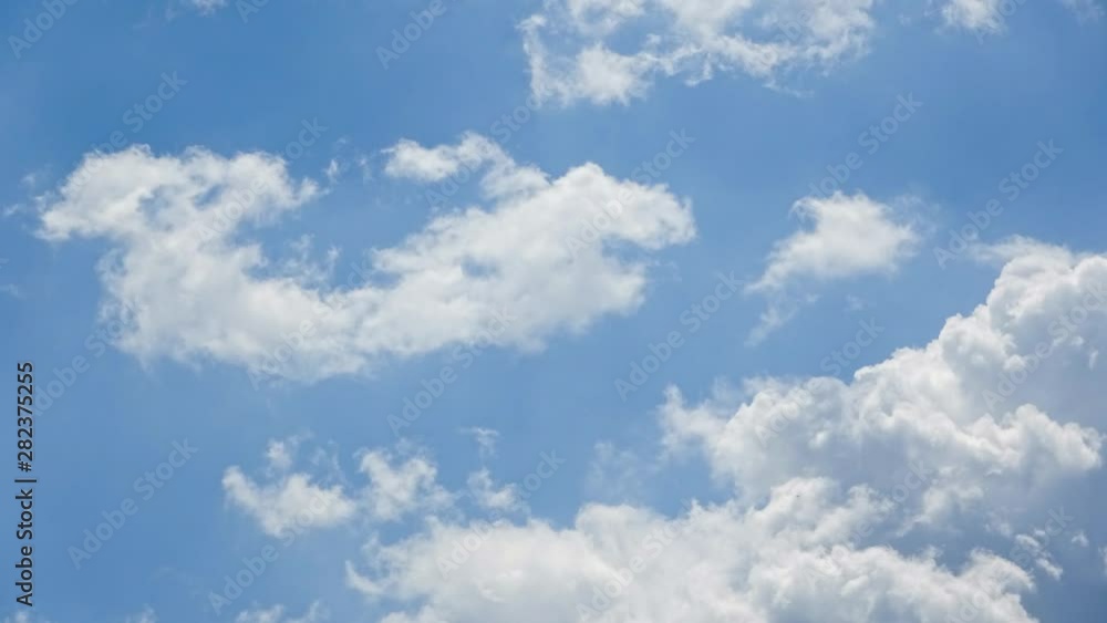 Clouds background time lapse, building motion cloud in blue sky. Abstract puffy fluffy ...