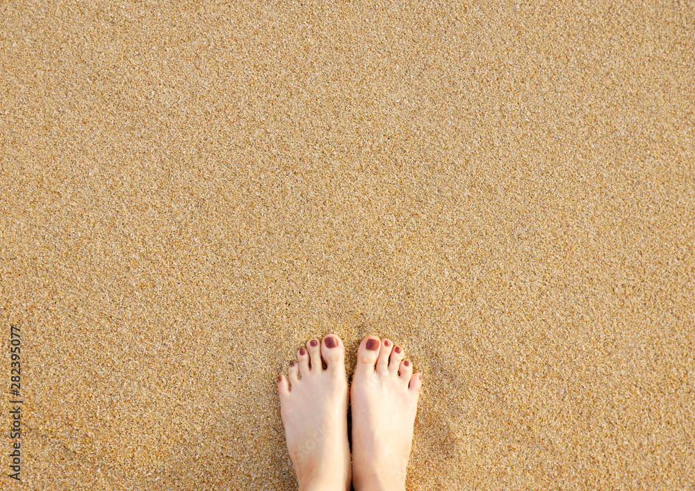 Feet on Sea Sand Beach Background. Top View. Closeup of Barefoot Woman ...
