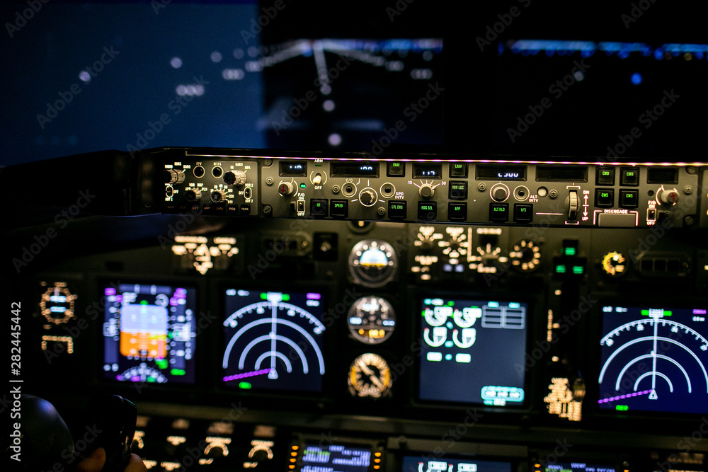 Aircraft interior, cockpit view inside the airliner. Point of view from ...