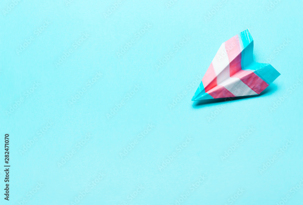 Photo & Art Print Paper airplane in transgender flag, alexmia