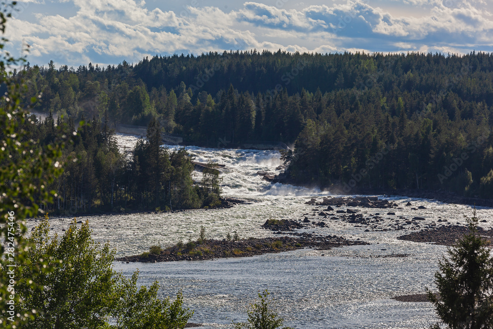 The rapids Storforsen in the Pite River in Swedish Norrbottens are one ...
