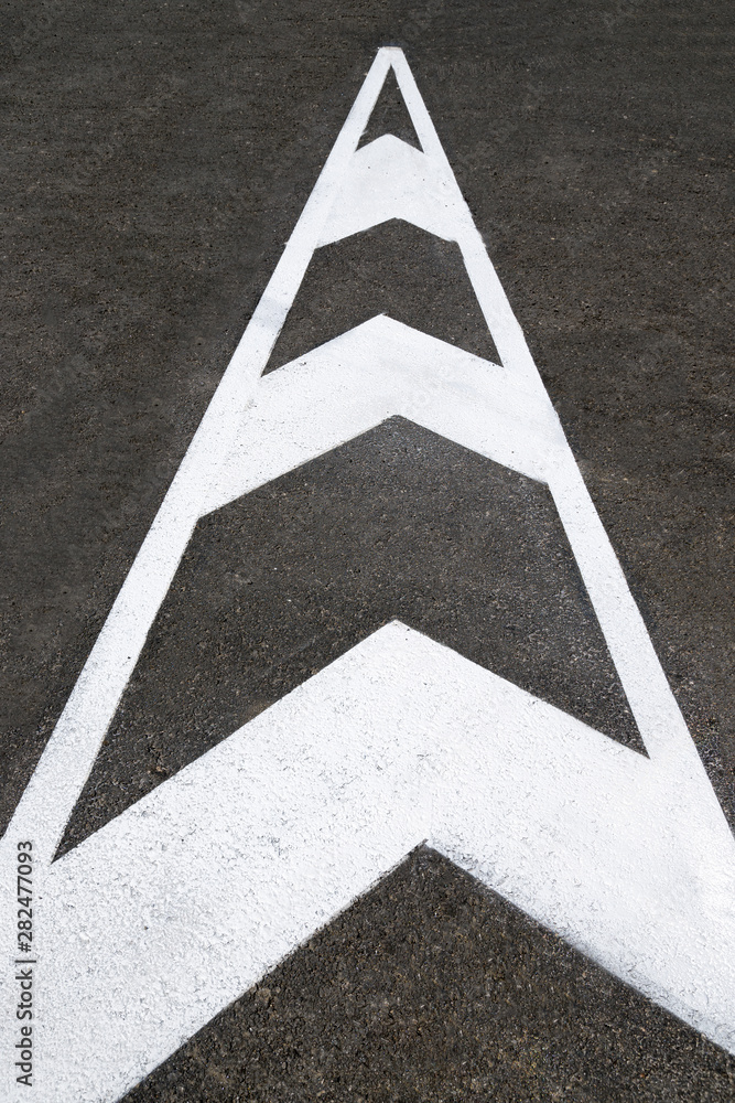 Dividing road markings on a new asphalt road. Stock Photo | Adobe Stock