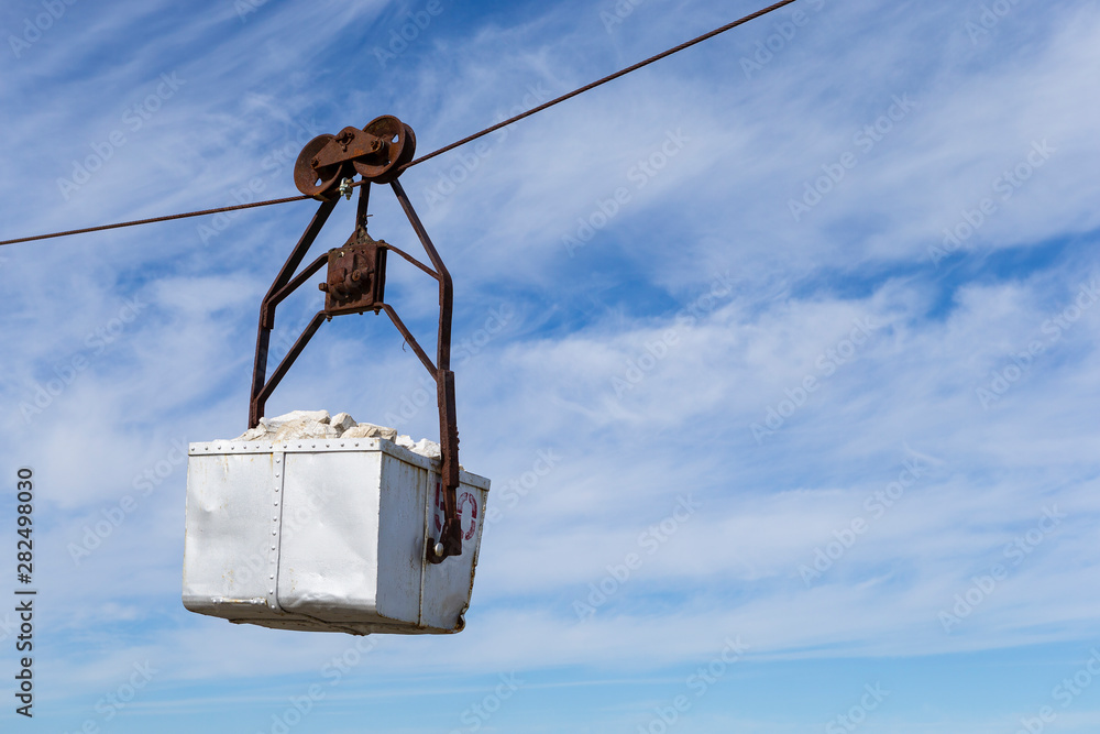 Mining Ore Cart on Aerial Tram Carrying Load of Rocks. Stock Photo ...