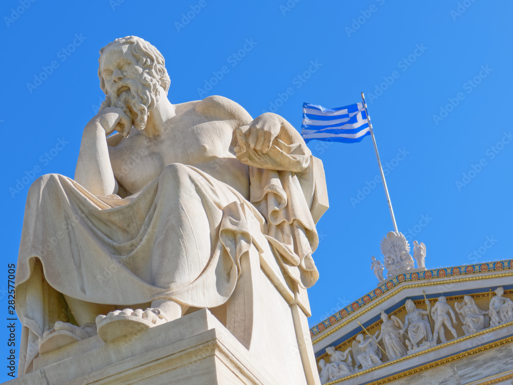 Socrates the ancient philosopher and greek flag with vibrant blue sky ...