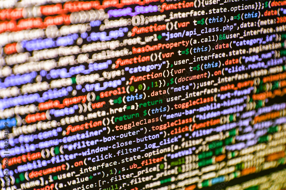 Code on dark background. Javascript code in bracket software. Web ...