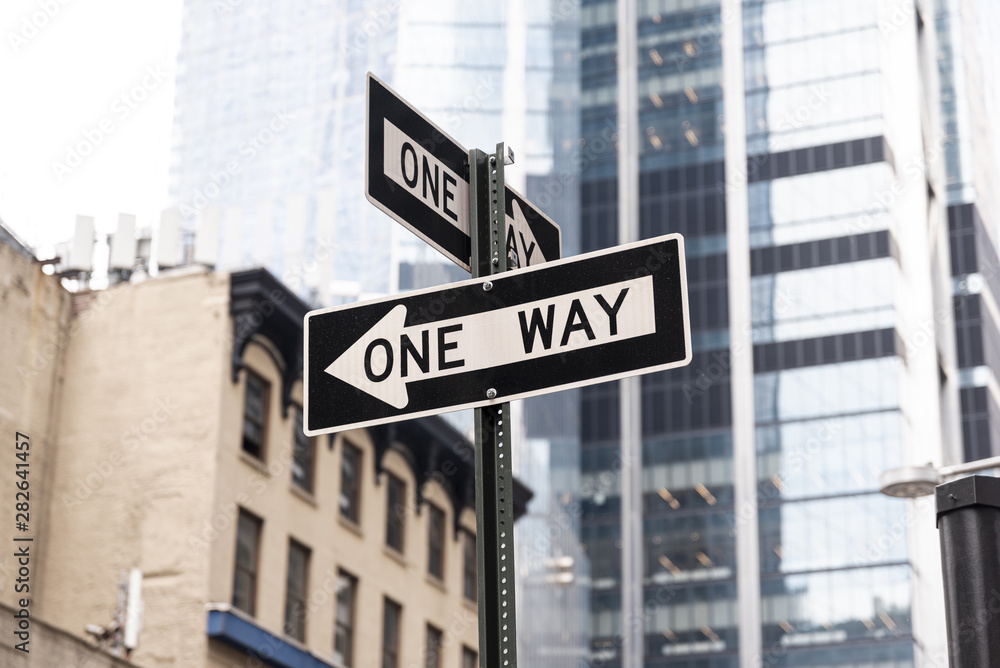 One way road sign in the city Stock Photo | Adobe Stock