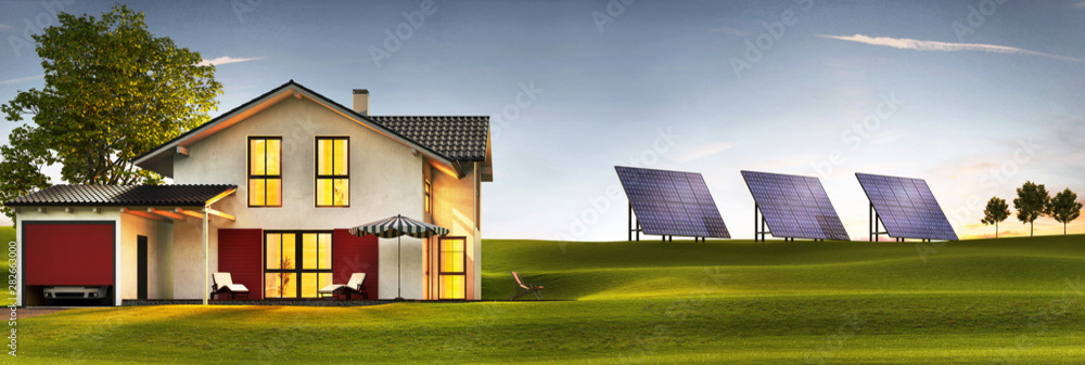 Evening view of a modern house with a lawn and solar panels Stock ...