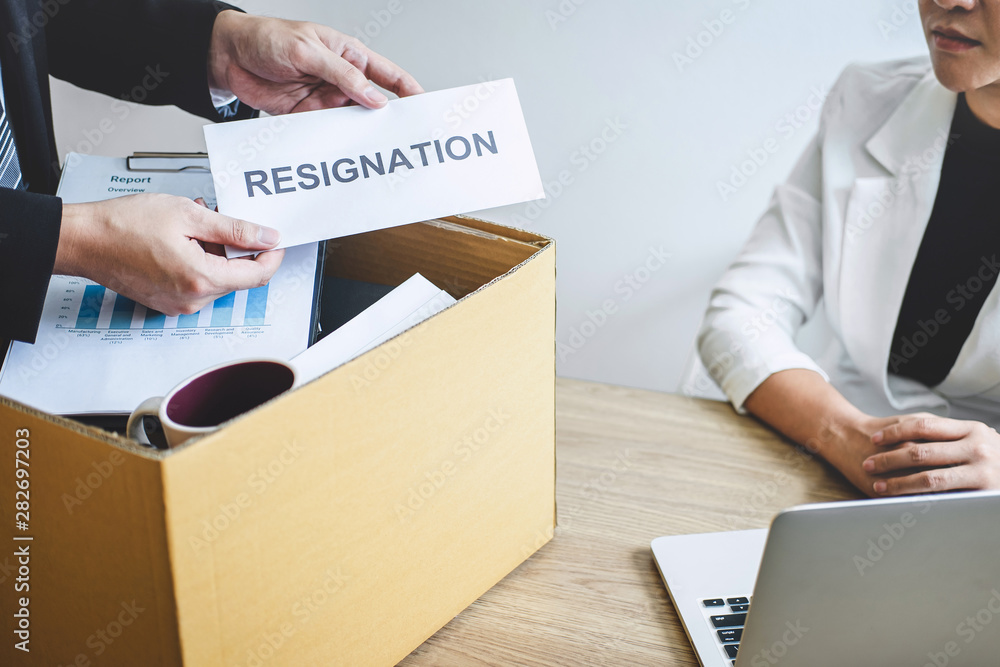 Businessman sending a resignation letter to employer boss in order to ...