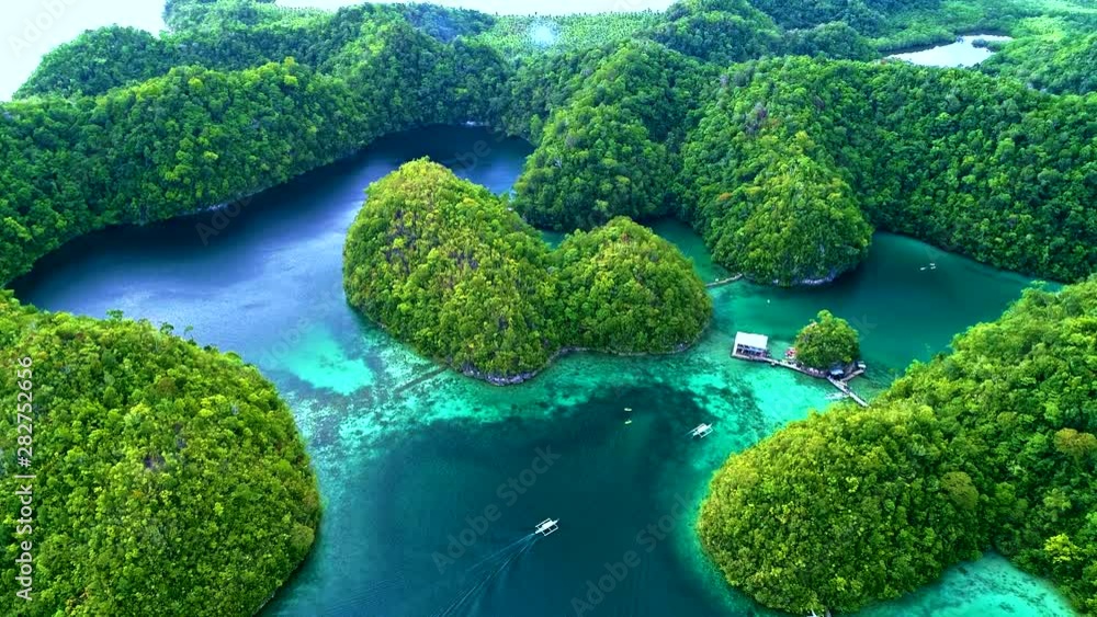 Tropical landscape rainforest hills and azure water in lagoon with ...
