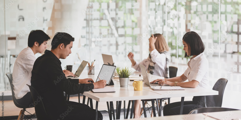 Business people exchanging the company strategy Stock Photo | Adobe Stock