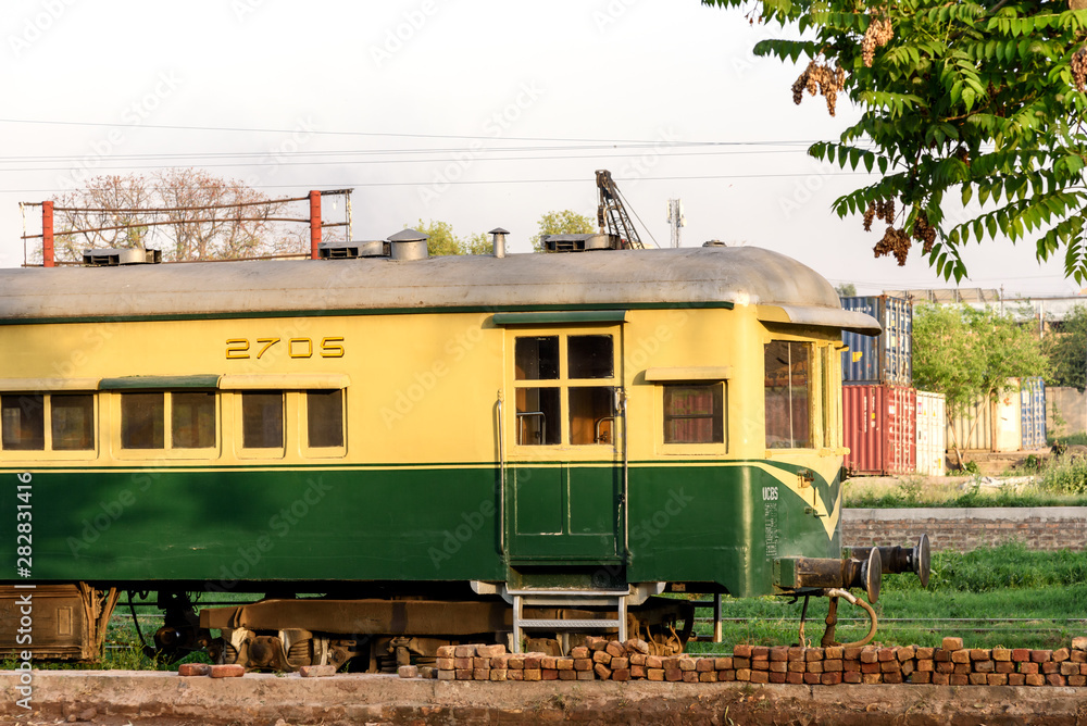 Green and yellow boggy of Pakistan railway trains. Stock Photo | Adobe ...