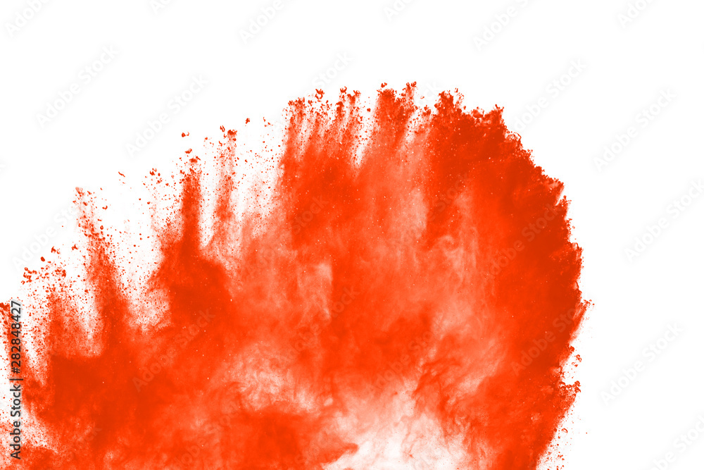 abstract orange powder splatted background,Freeze motion of color ...