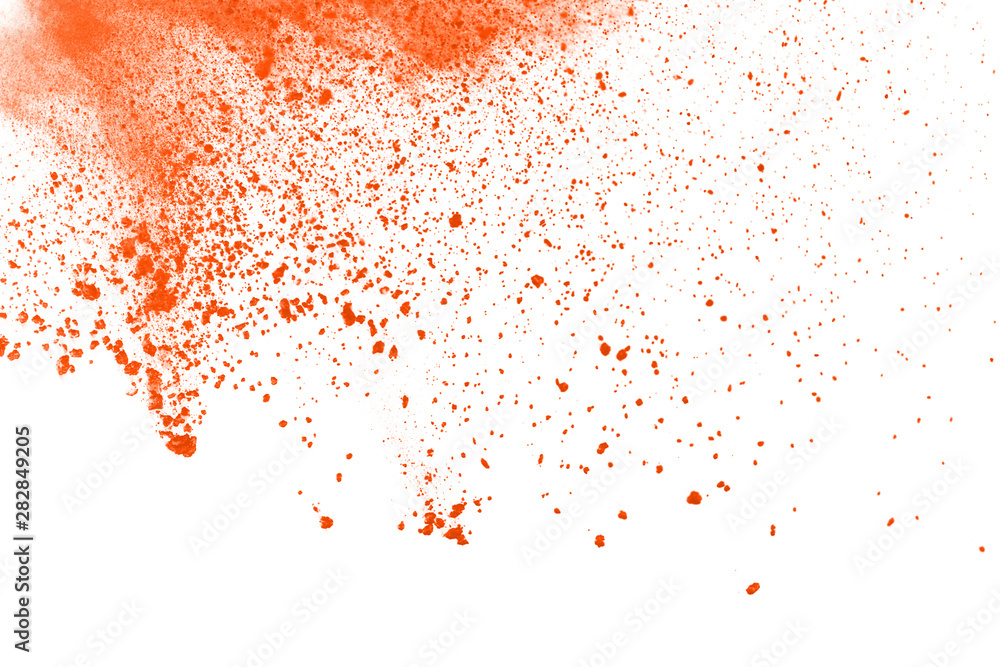 abstract orange powder splatted background,Freeze motion of color ...