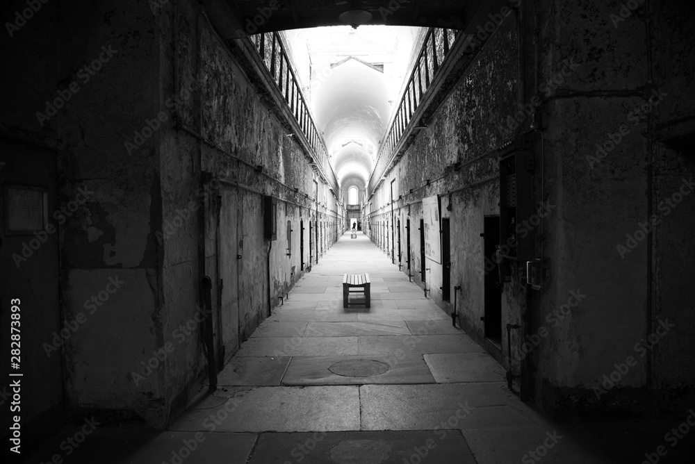 Prison corridor with cells on both sides Stock Photo | Adobe Stock