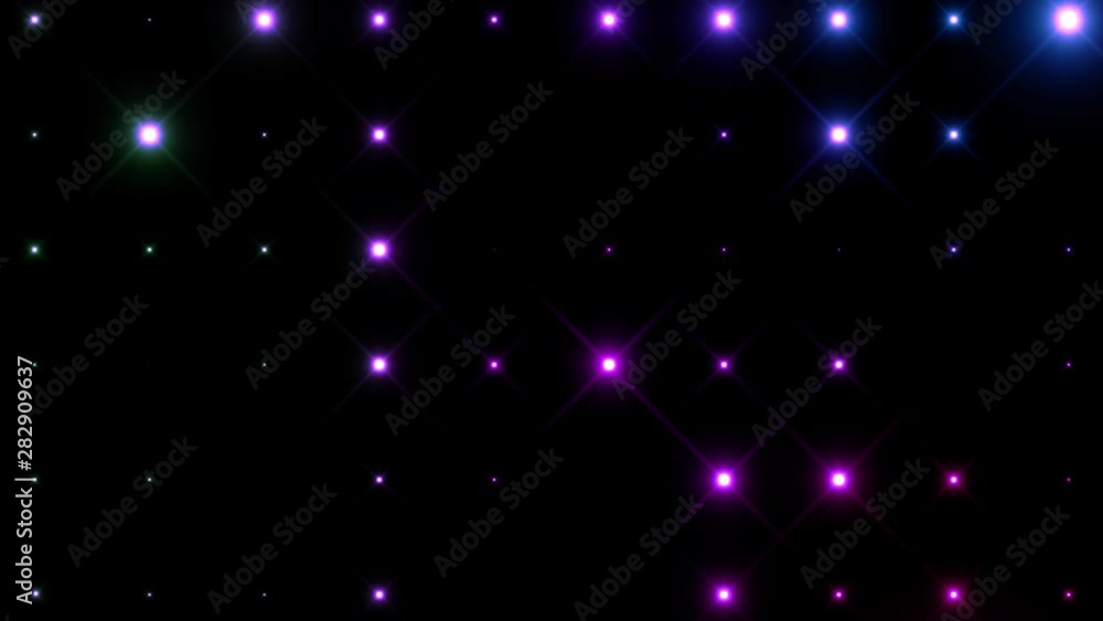 Green, blue, purlpe and pink flashing lights on black disco panel ...
