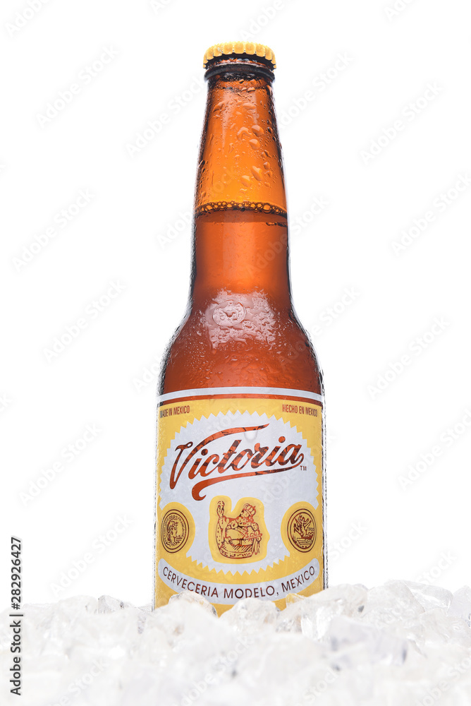 IRVINE, CALIFORNIA - MARCH 21, 2018: A bottle of Victoria Beer in ice ...