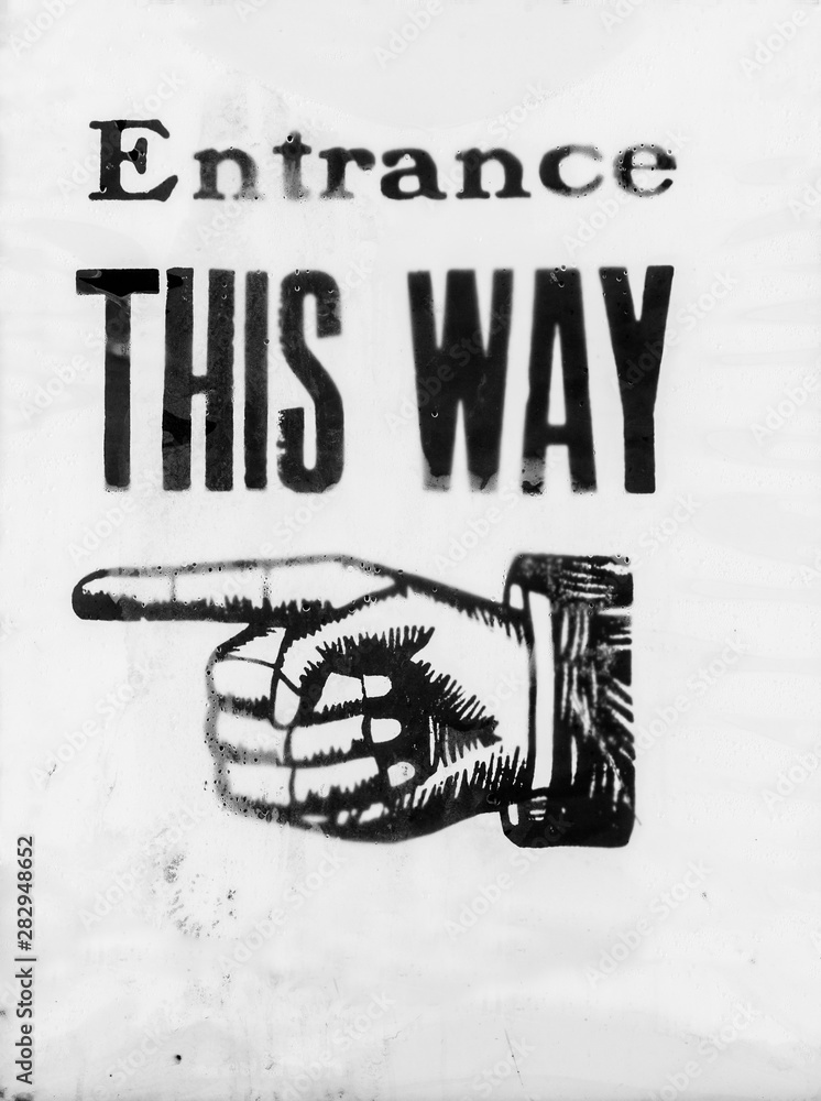 Entrance This Way sign board Stock Photo | Adobe Stock