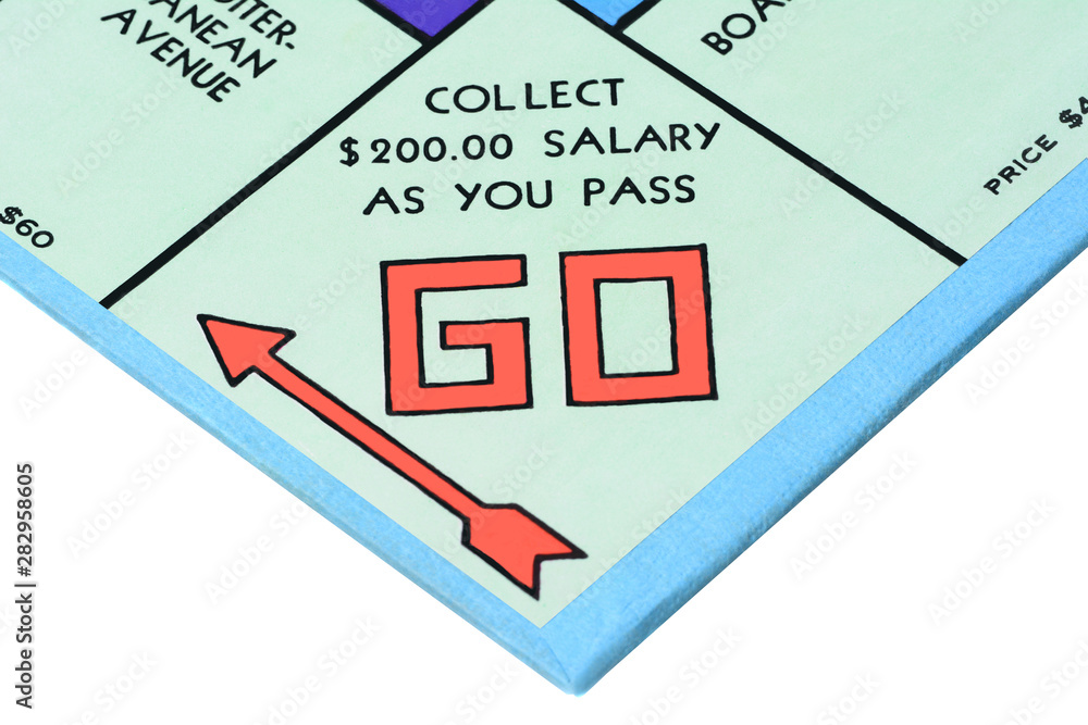 IRVINE, CA - MAY 27, 2014: Monopoly board game closeup of the Go corner ...