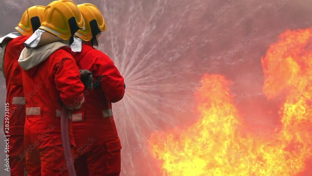 HD Slow motion wide shot firefighter in fire suit on safety rescue duty ...