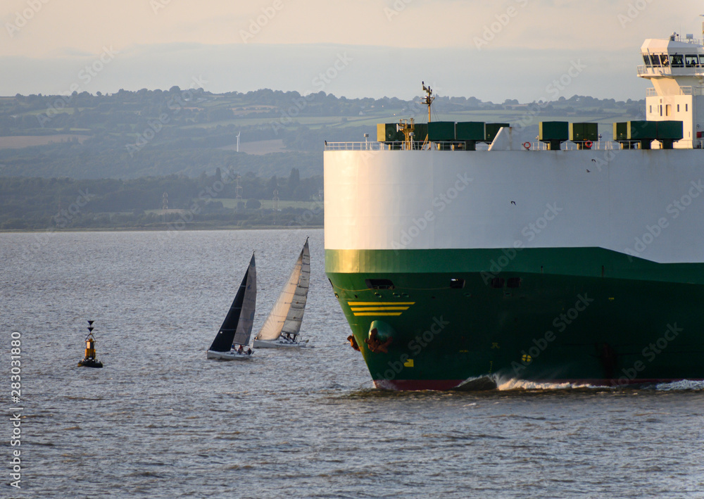 Ship and yachts near miss collision Stock Photo | Adobe Stock