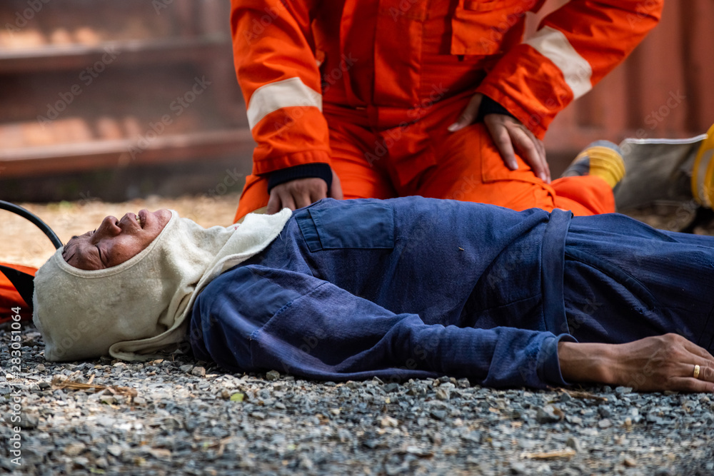 Medium shot of firefighter in fire suit on safety rescue duty help a ...