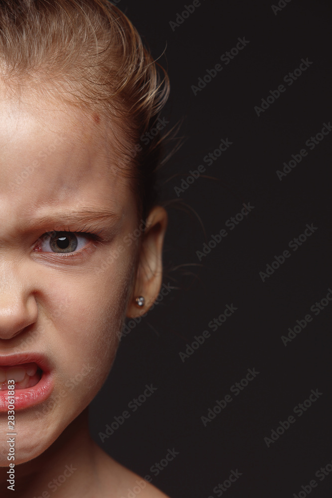 Close up portrait of little and emotional caucasian girl. Highly detail ...
